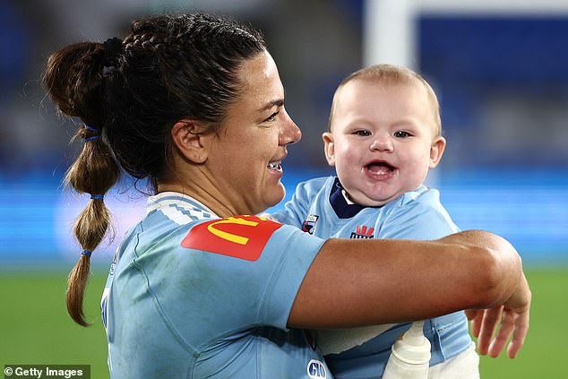 Innocent image of Millie Elliott feeding her baby after State of Origin ...