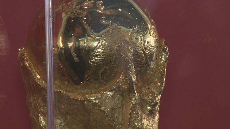 Local soccer fans get rare close-up with World Cup trophy