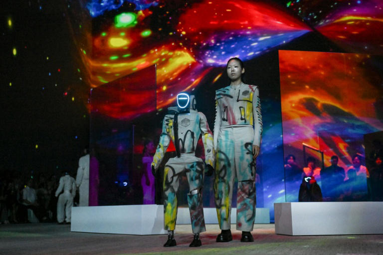 'Robots need clothes': Humanoids hit catwalk in Seoul