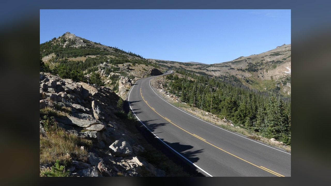 Colorado has a road that climbs above the clouds and you can drive it