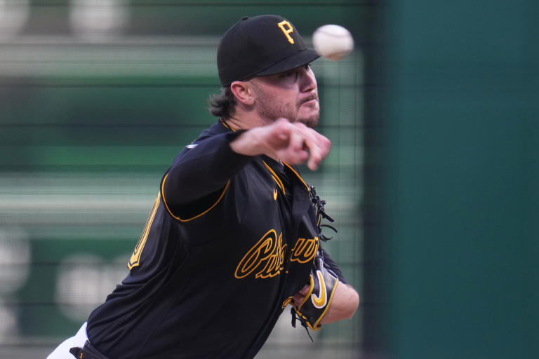 Pirates settle for series split after shaky defense, another Happ homer