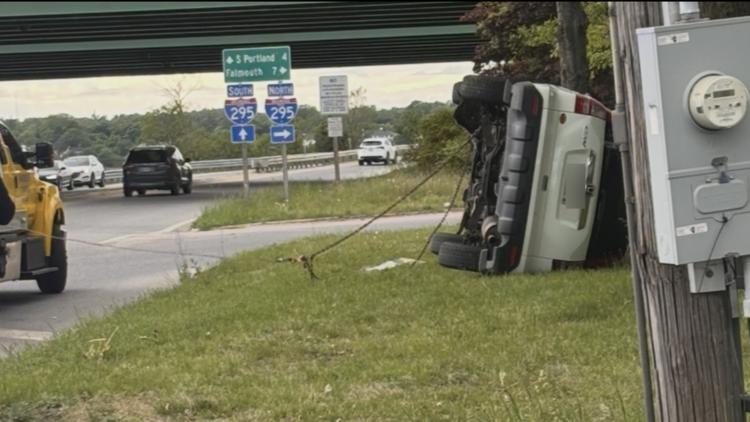 Car flips at busy intersection near I-295 in Portland