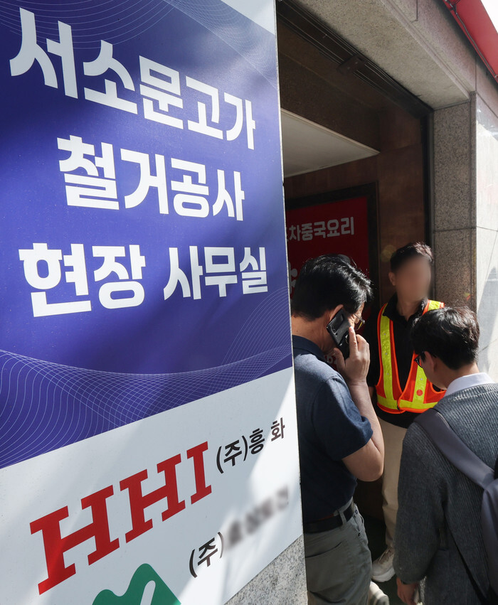 Police raid related to overpass collapse