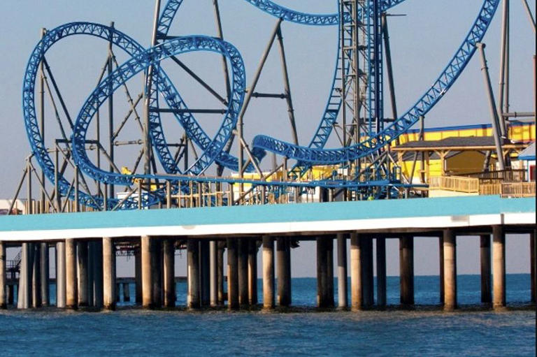 Texas roller coaster breaks down as riders left dangling midair in ...