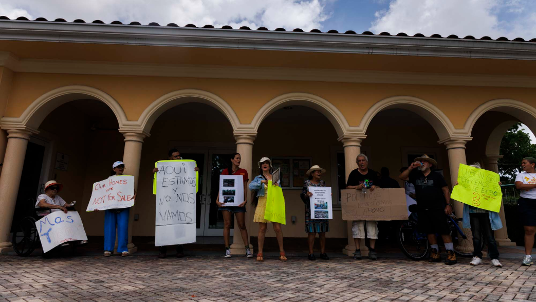 Trailer park residents protest outside of Commissioner Rosado's office