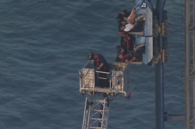 Texas roller coaster breaks down as riders left dangling midair in ...