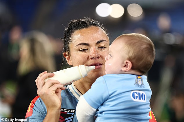Innocent image of Millie Elliott feeding her baby after State of Origin ...