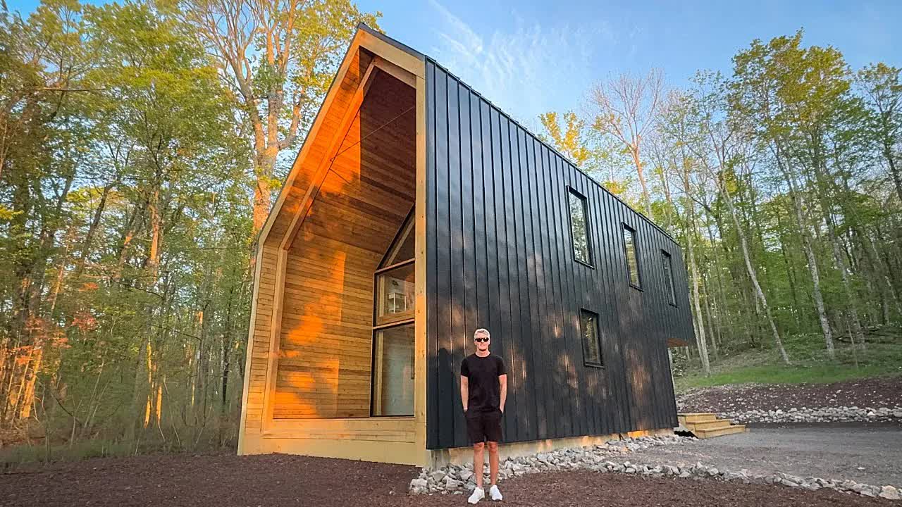 Inside a stunning 2-storey prefab cabin built from a kit!