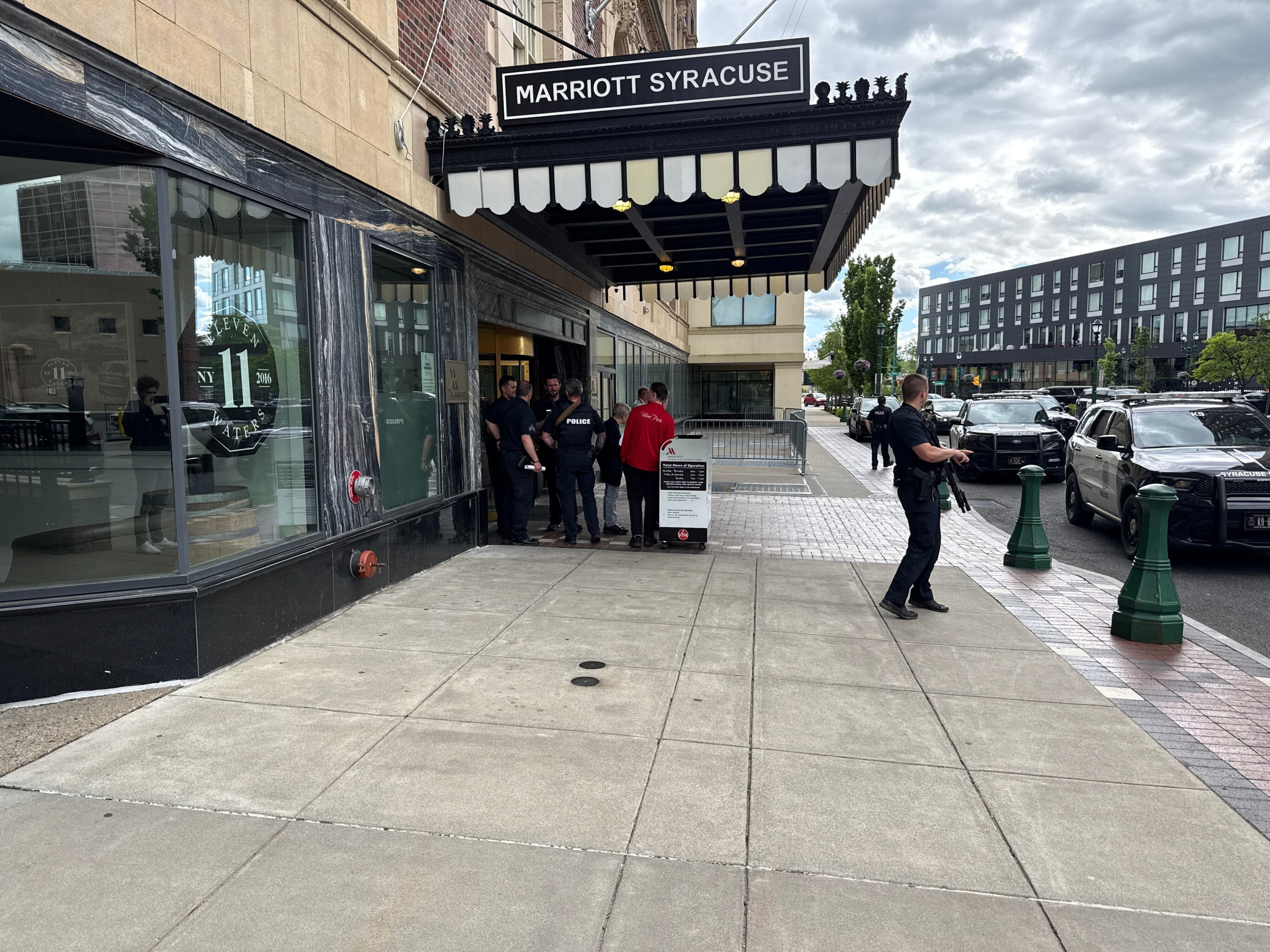 Police swarm downtown Syracuse hotel after gunfire reported in room. It ...