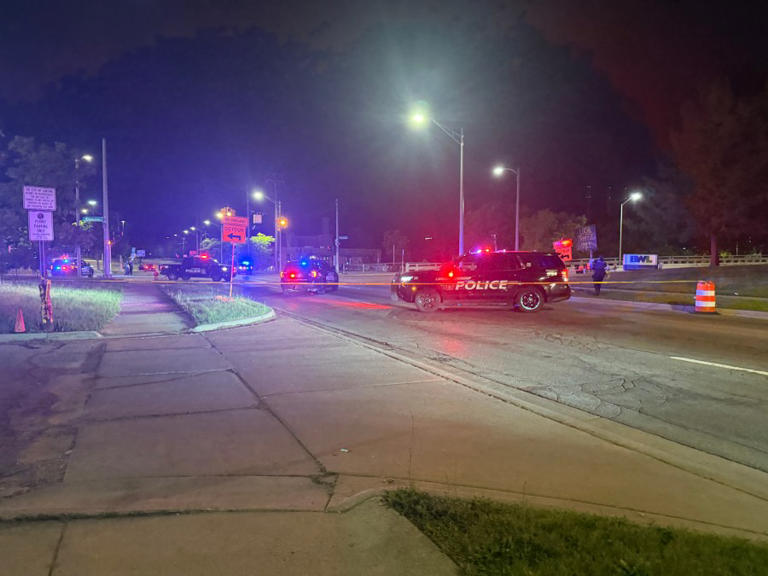 Police set up perimeter at intersection near downtown Lansing