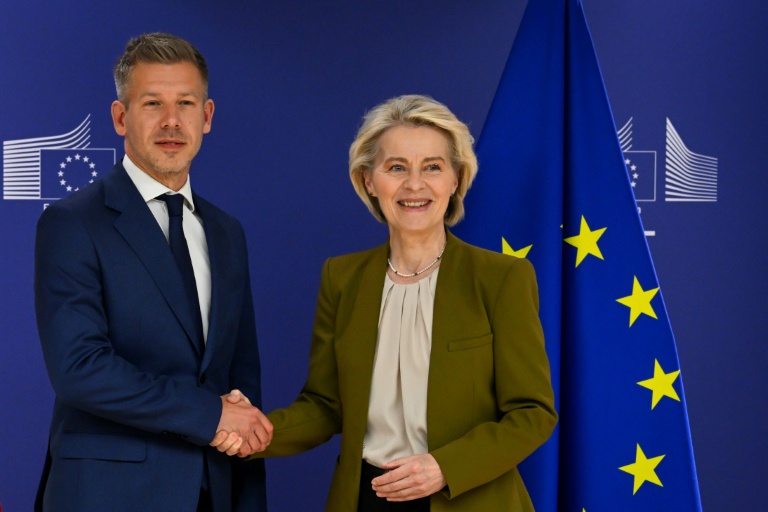 Hungary's PM in Brussels frozen funds talks with EU chief