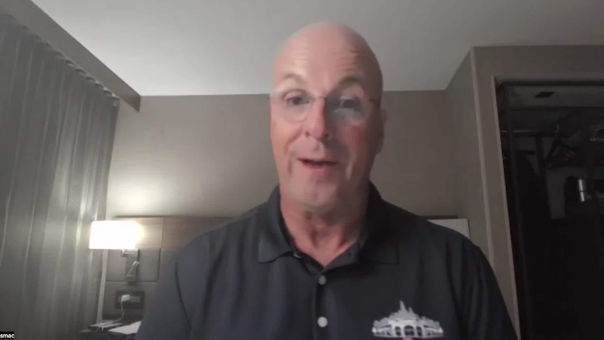 Josh talks with UIC baseball coach Sean McDermott