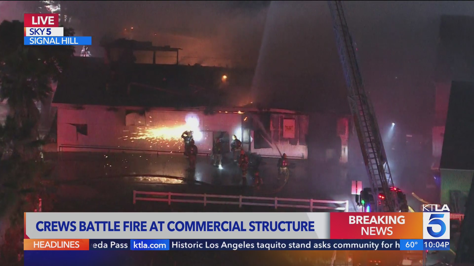 Firefighter battle commercial structure fire in Signal hill