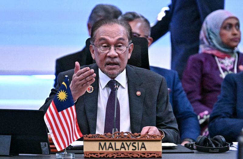 Explainer - why Malaysia's Anwar is considering a snap election