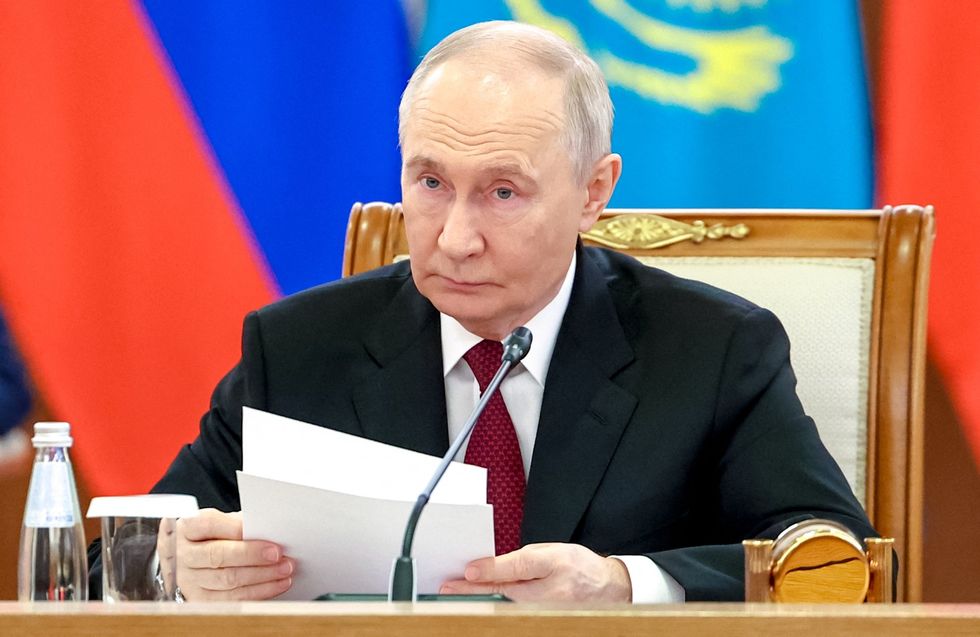 Russian minister 'accidentally calls Vladimir Putin his body-double's ...