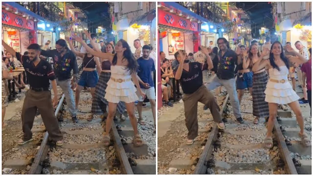 Indian tourists dance to 'Chaiyya Chaiyya' on Vietnam train street ...