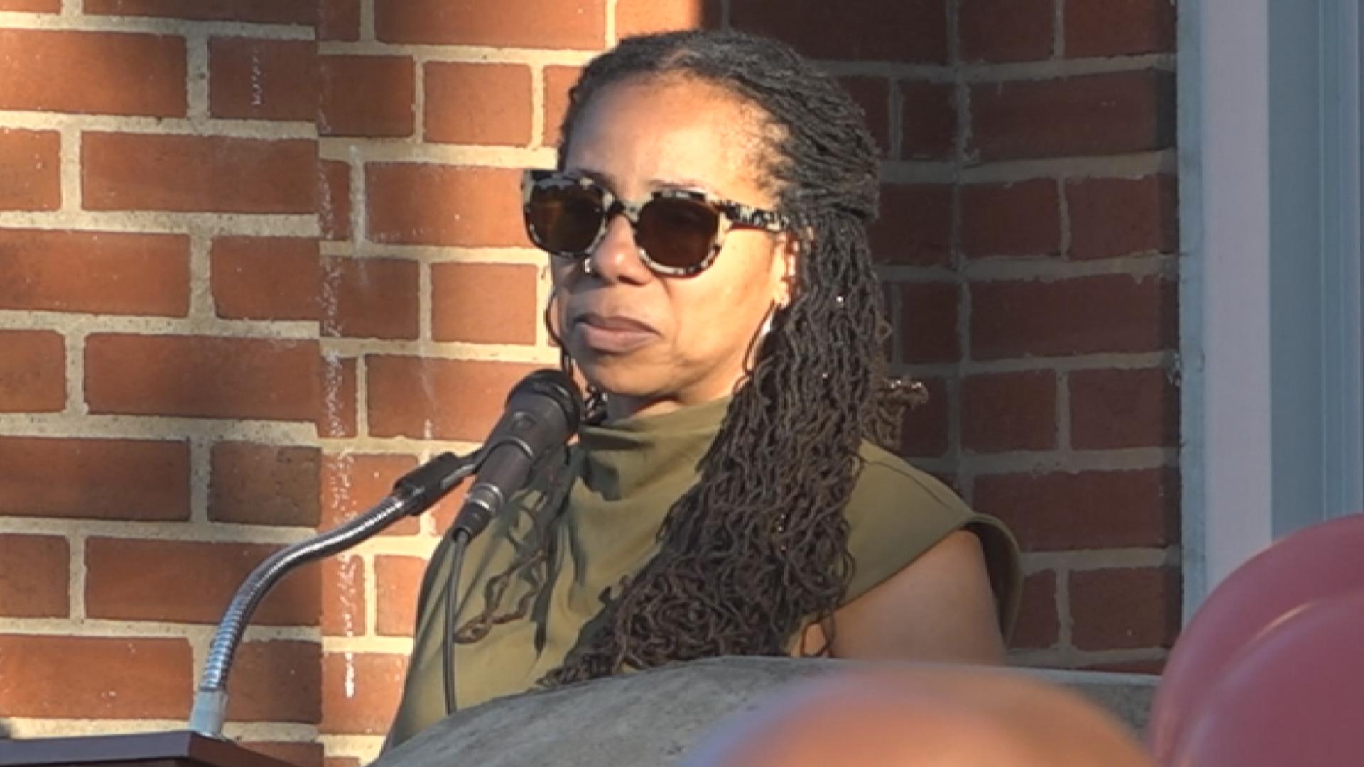 Ayesha Bell speaks at vigil for her son Najee Hardaway, a Shaker ...