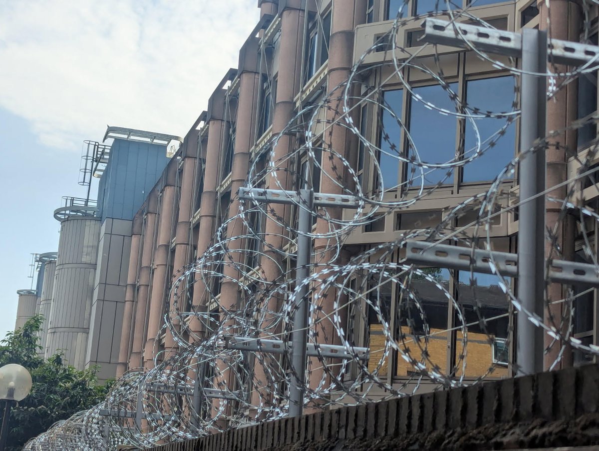 Razor wire at new Chinese super embassy site after security incident