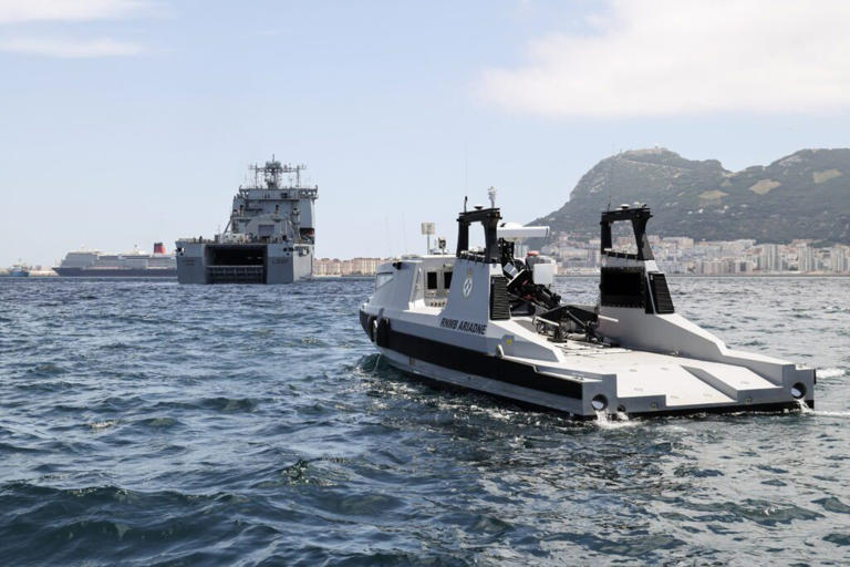 Royal Navy docks crewless minehunter in mothership for first time