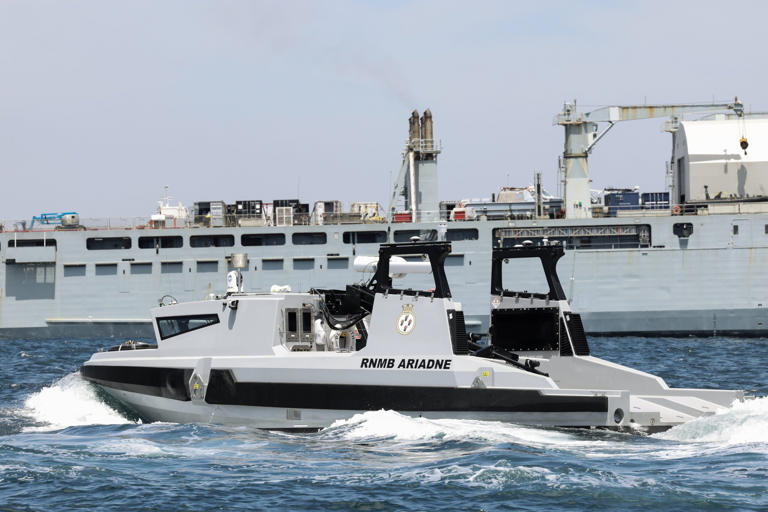 Royal Navy docks crewless minehunter in mothership for first time