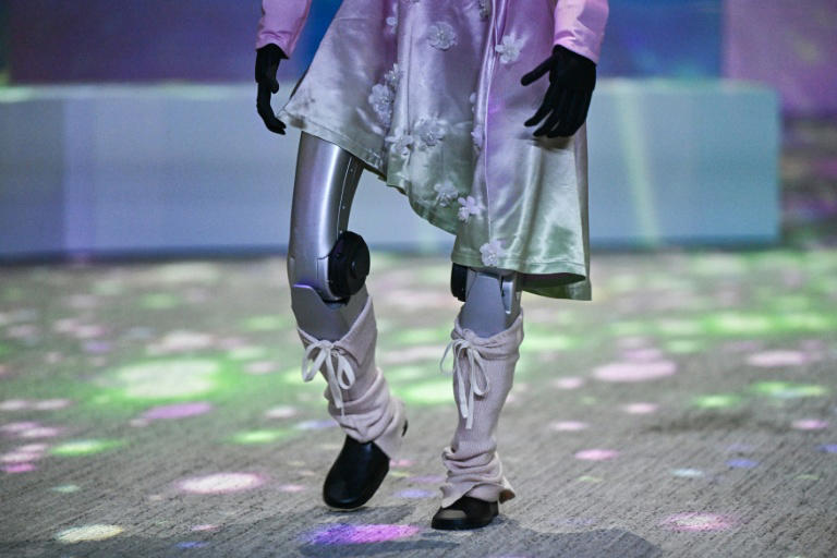 'Robots need clothes': Humanoids hit catwalk in Seoul