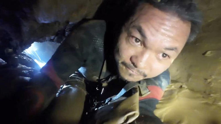Rescuers pull first trapped person from flooded Laos cave