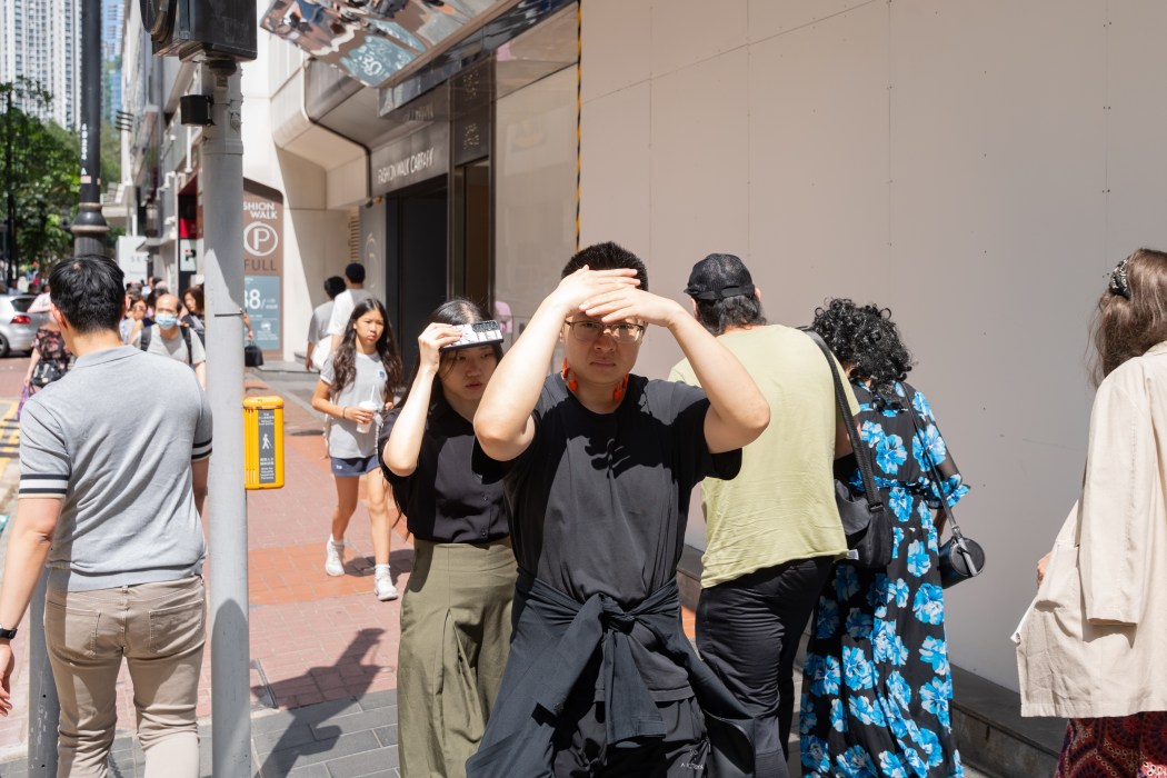 Hong Kong swelters as temperatures exceed 36°C; rain to bring temporary ...