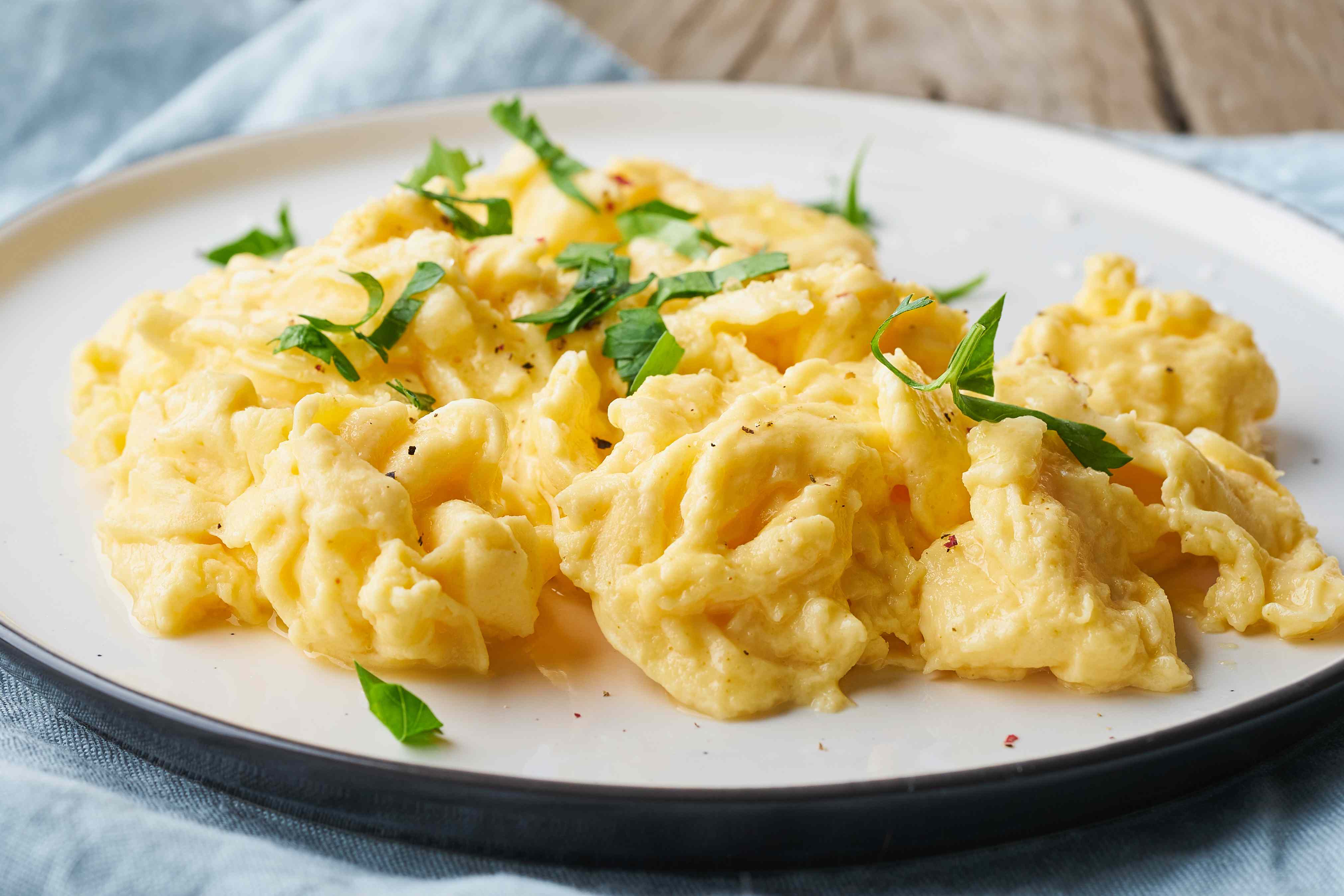I asked 4 chefs if you should add milk to scrambled eggs—and they all ...