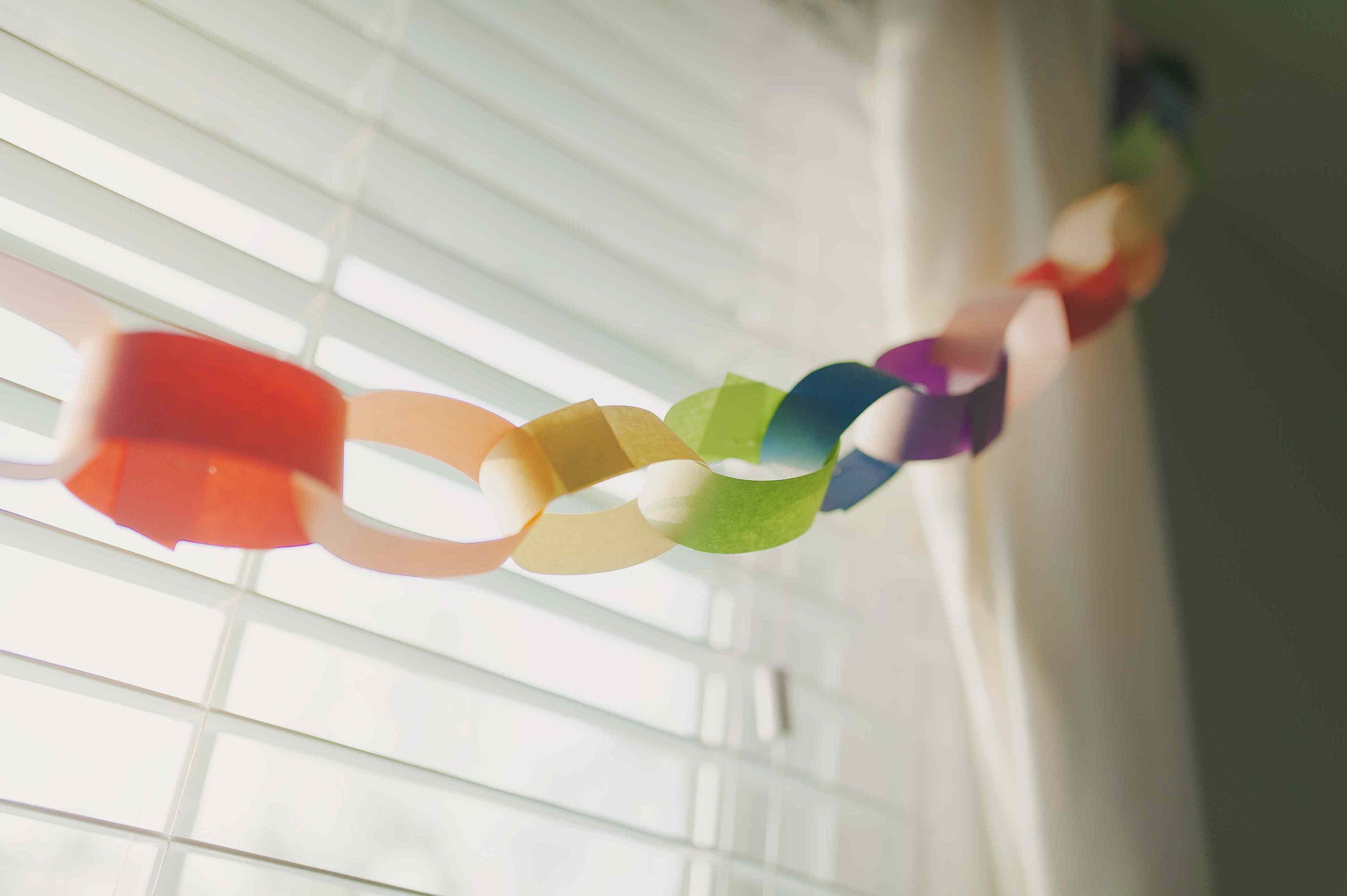 This easy DIY sun catcher garland will fill your room with rainbow light