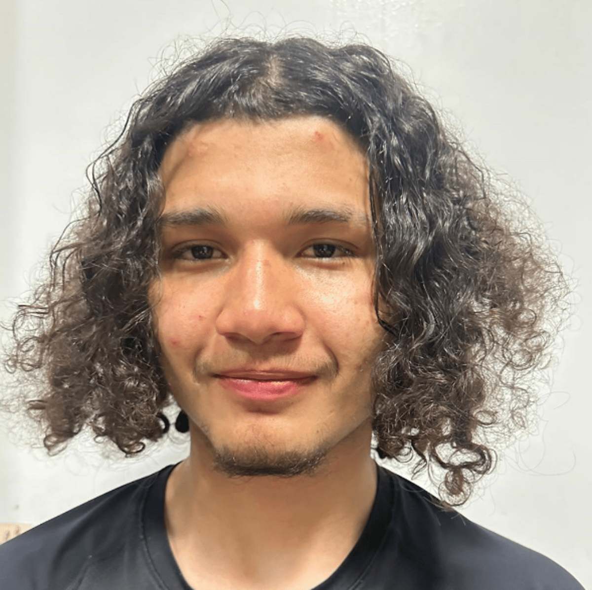 Pictured: Boy, 15, stabbed to death in Hackney as teenager arrested