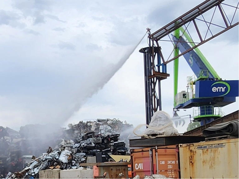 Firefighters battle large junkyard fire at Camden recycling plant at ...