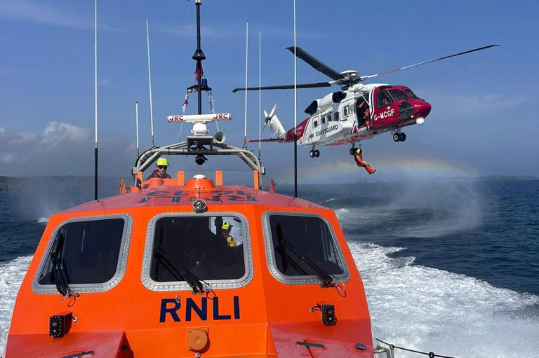 Dramatic rescue after child falls onto rocks as tide rushes in