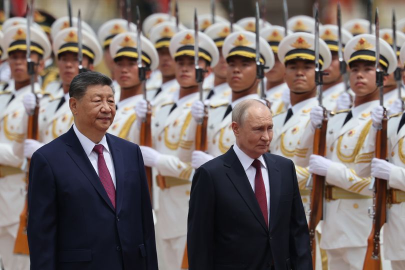 World War 3 is just 'a few moves' away as Putin-led new axis of evil ...