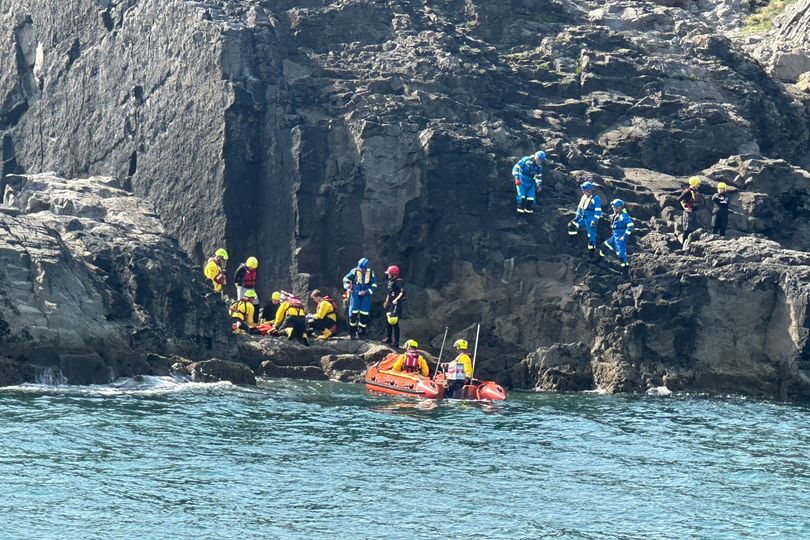 Dramatic rescue after child falls onto rocks as tide rushes in