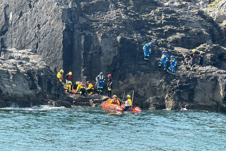 Dramatic rescue after child falls onto rocks as tide rushes in