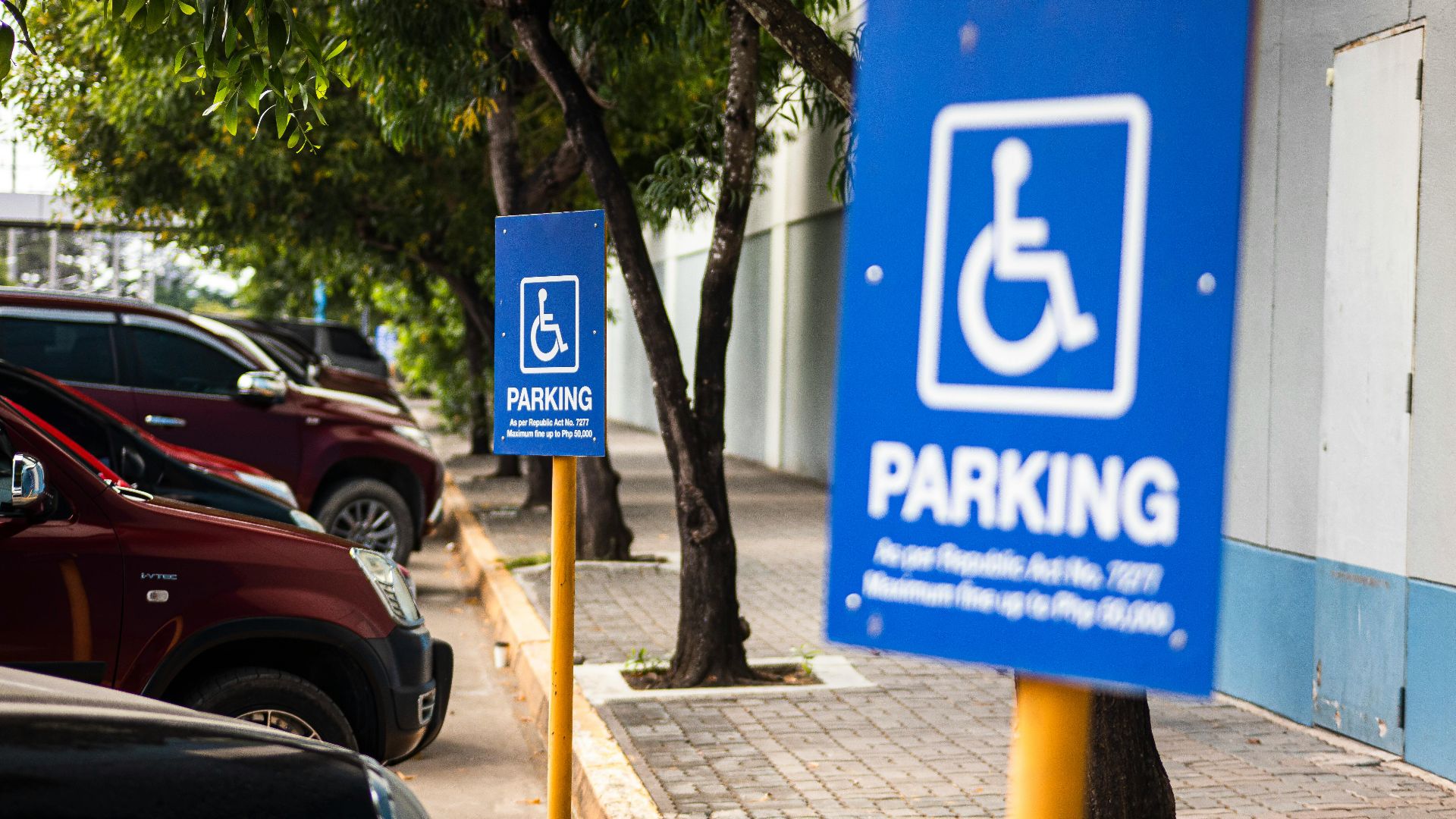 My apartment has disabled parking that I use right next to an EV ...