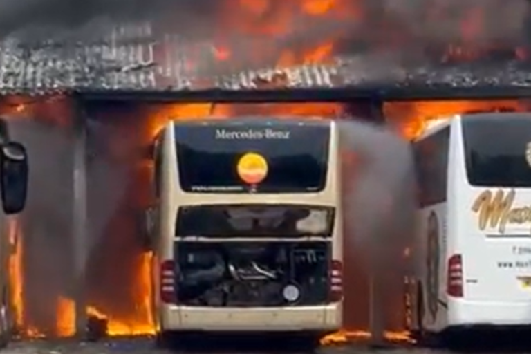 Shocking video shows huge fire ravaging Rotherham coach firm with ...