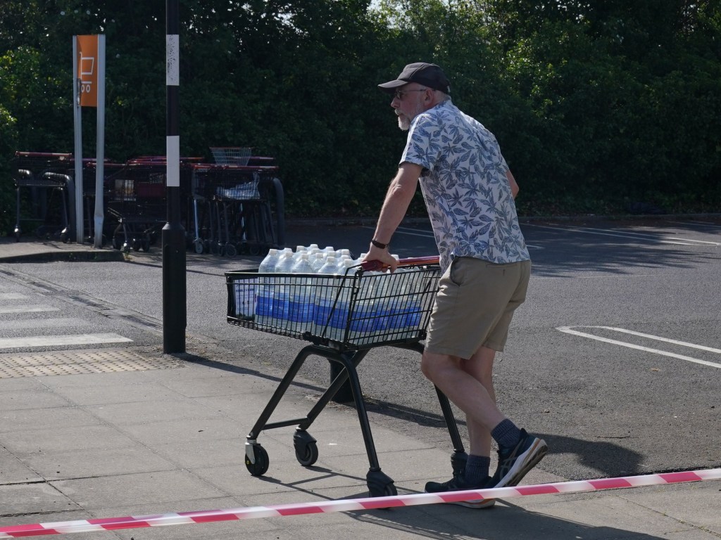 Thousands in UK forced to queue up for water after supply hits ...