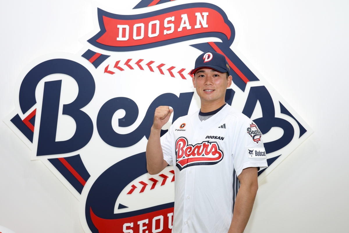 Bears sign Japanese pitcher Takada to fill Asian quota