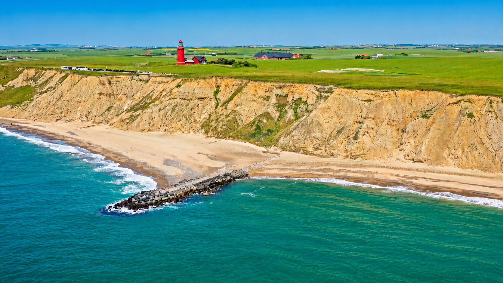 A lonely lighthouse standing on the edge of coastal cliffs