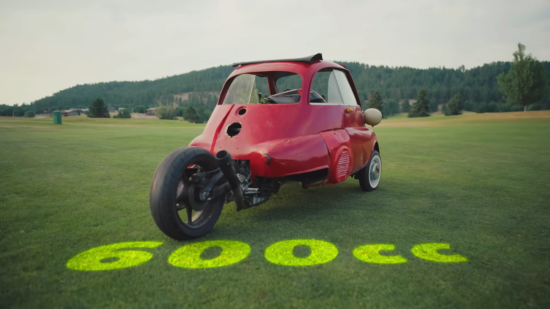 Look how we stuffed a motorcycle engine into the world's smallest car