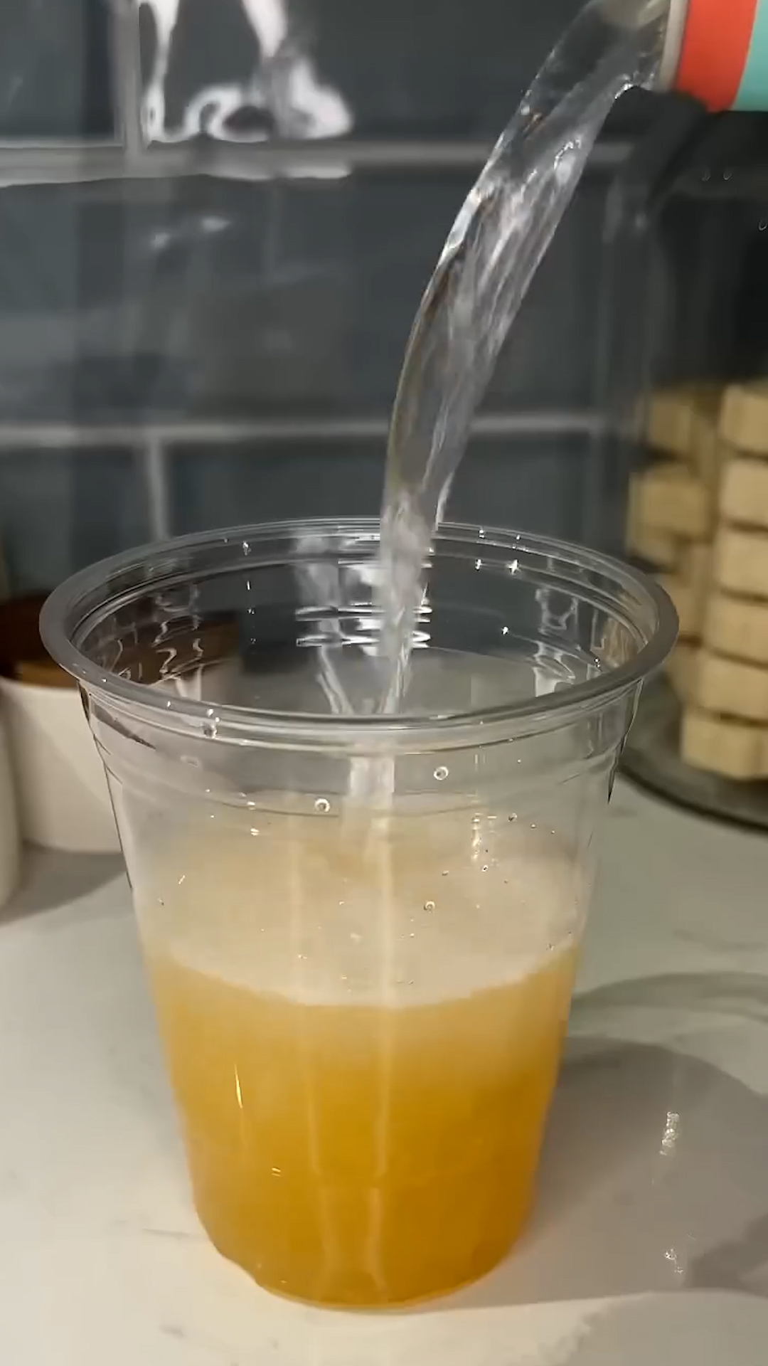Fruit drink enhanced with homemade juice-filled tapioca balls