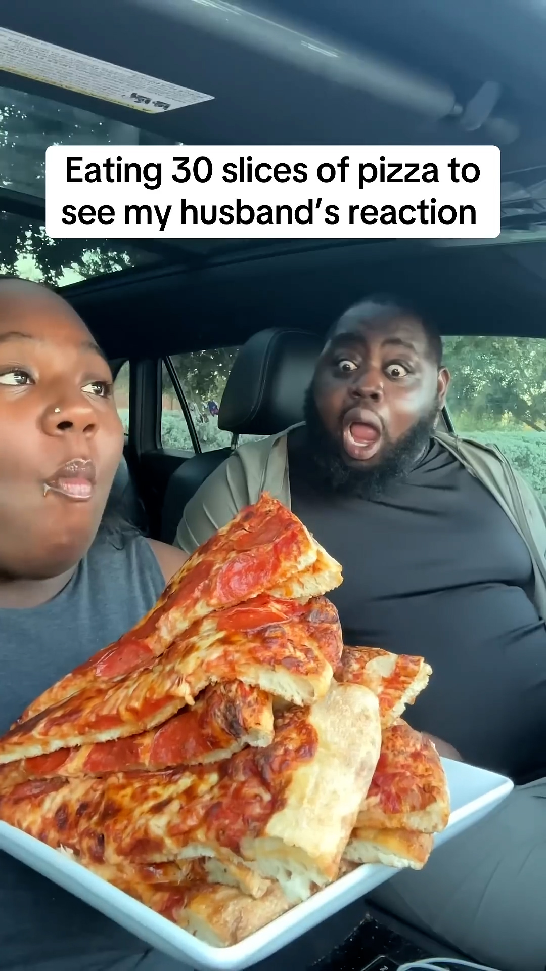 Husband watches in disbelief as I devour thirty pizza slices