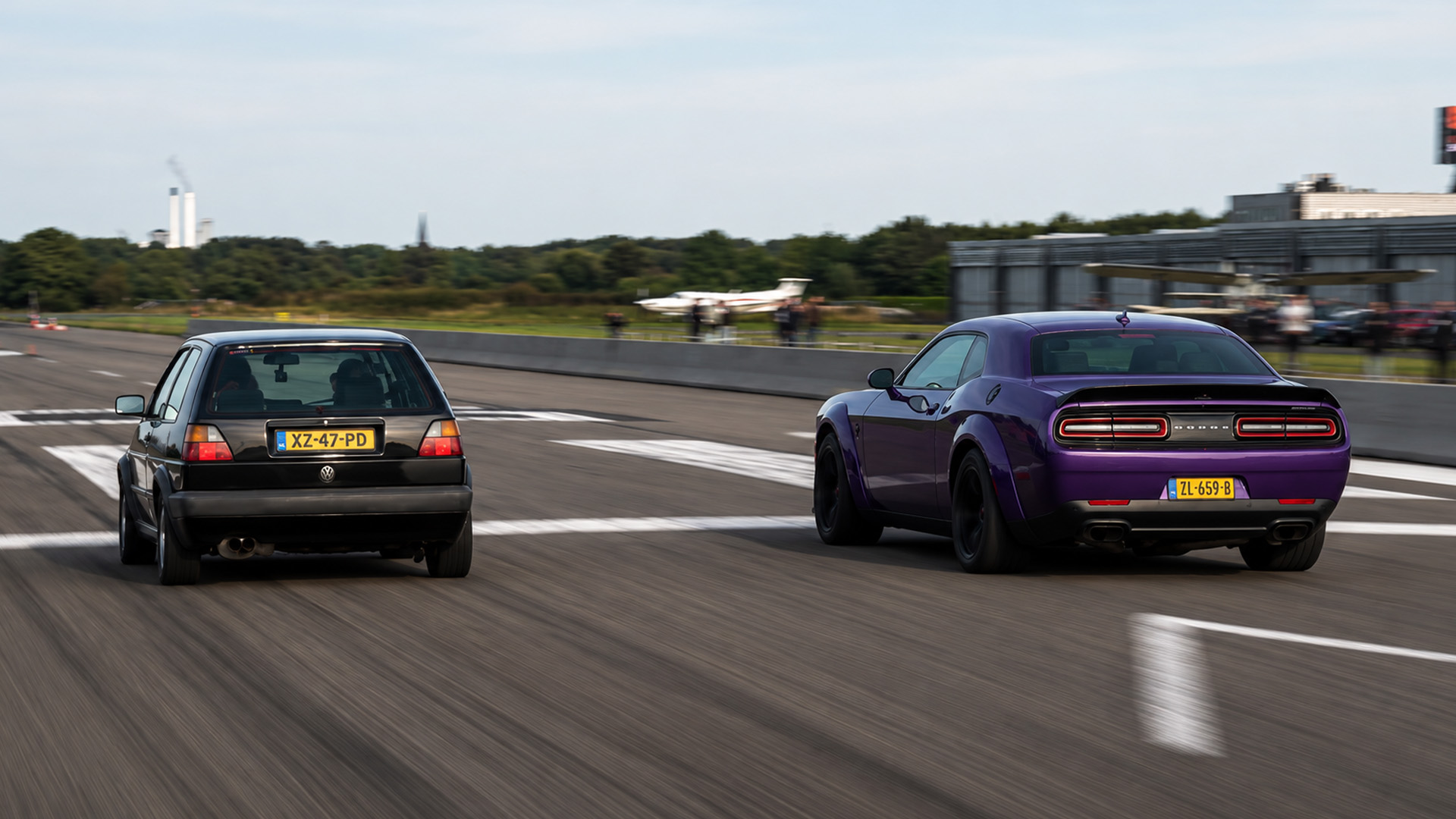 A Challenger SRT drag race with an unexpected rival