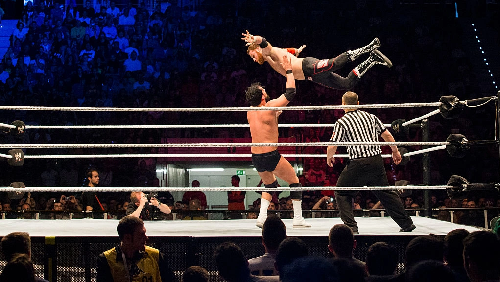 Kevin Owens and AJ Lee absent as WWE tensions rise