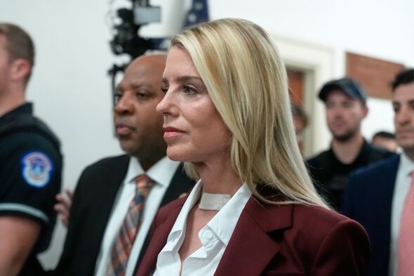 Pam Bondi enters Epstein hearing with bandaged neck after cancer treatment