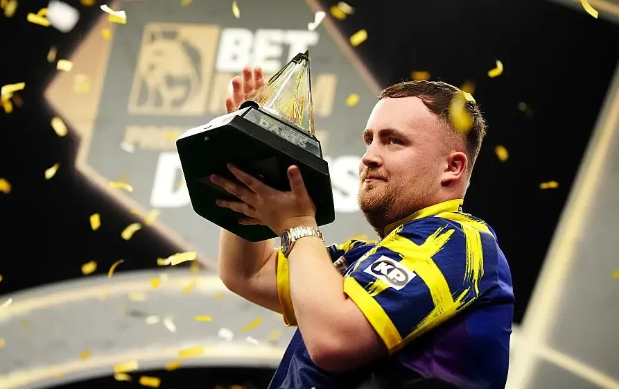 Littler overcomes boos to clinch second Premier League crown