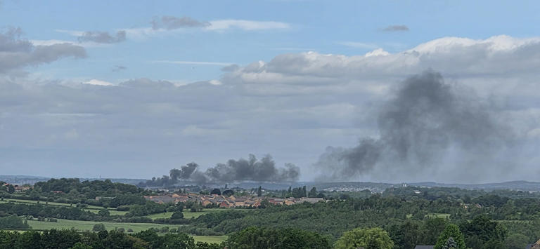 Huge fire at Rotherham's Maxfield's Travel which sent thick black smoke ...
