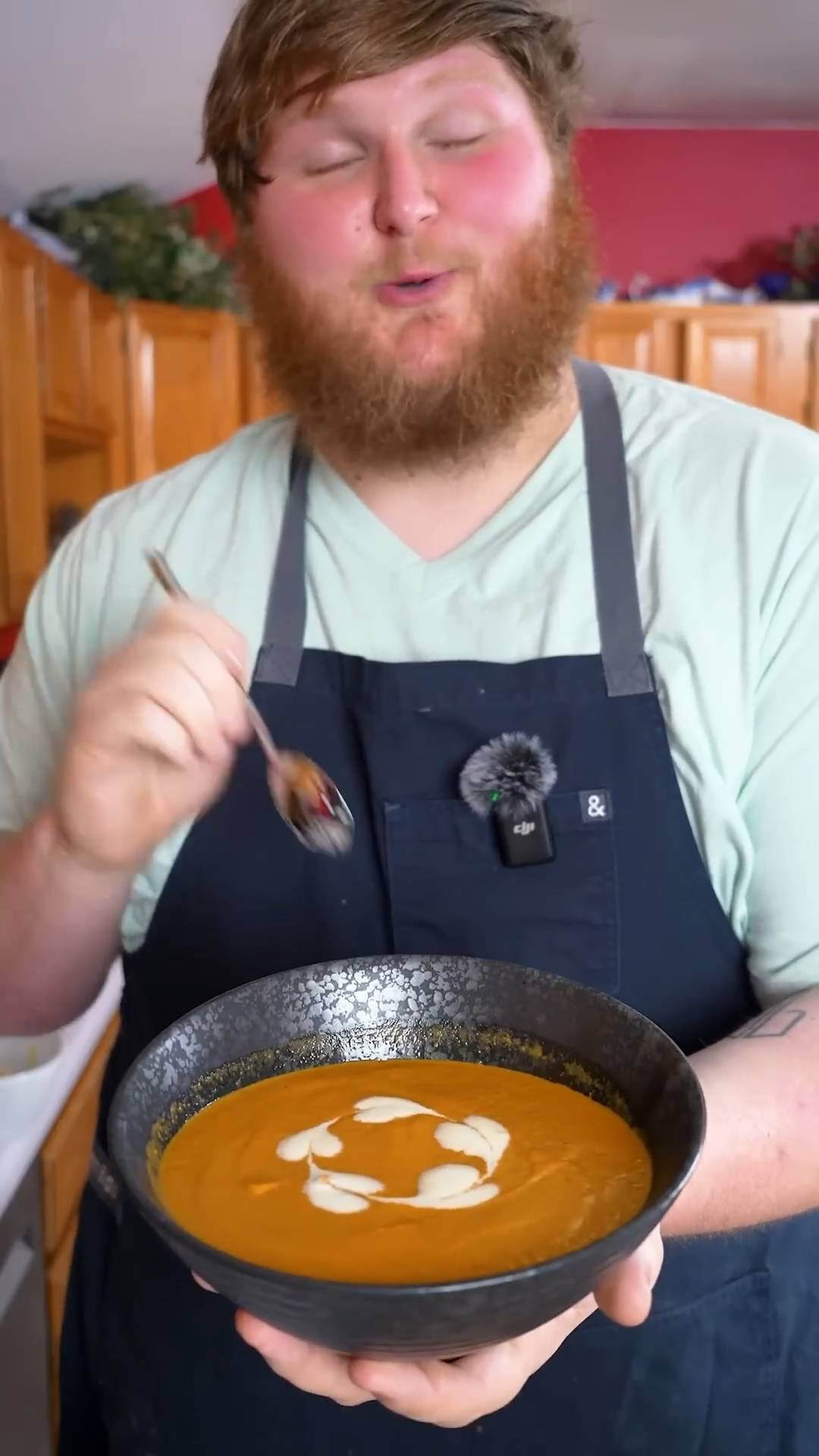 Creamy roasted tomato soup with fresh basil and grilled cheese