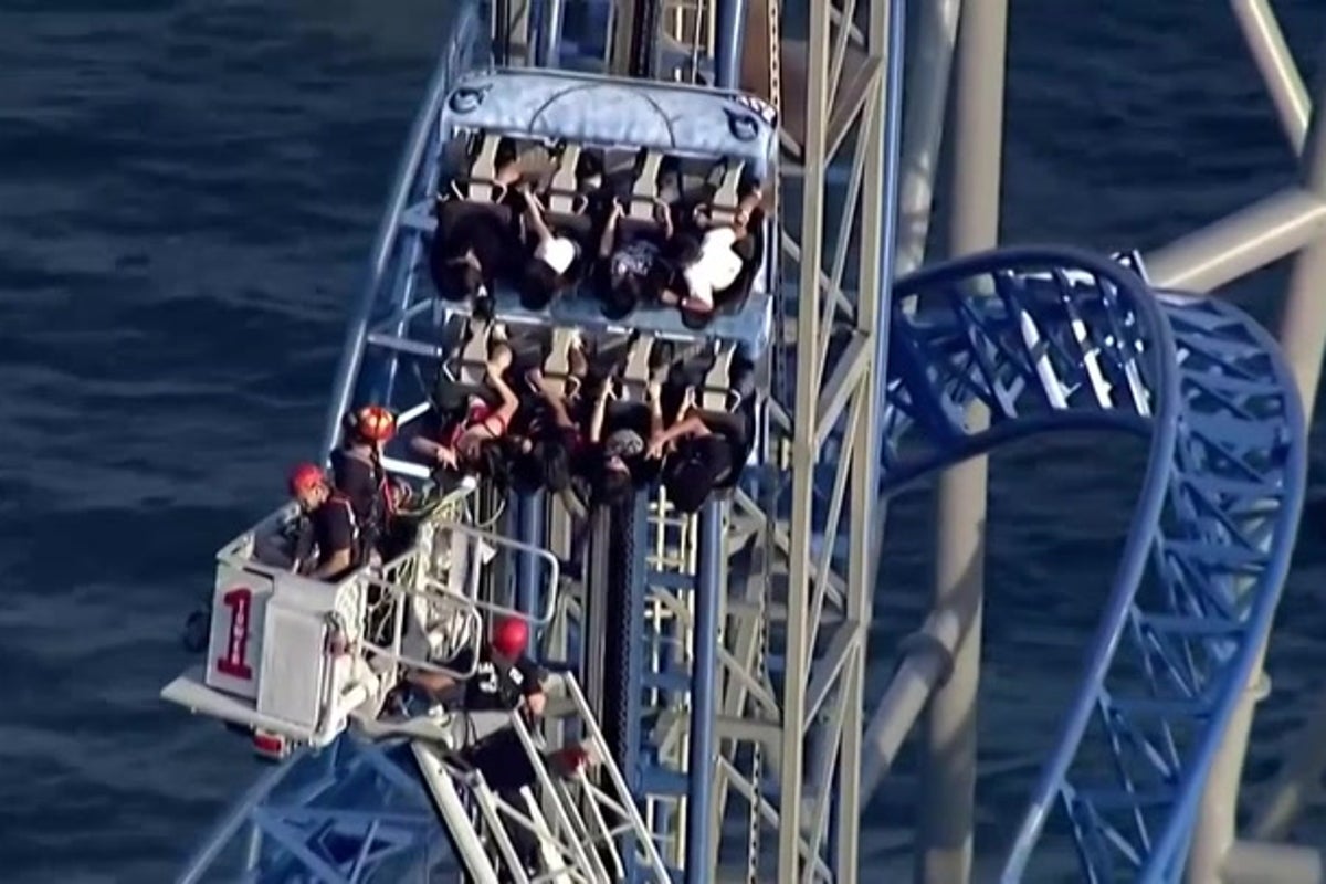 Rollercoaster riders stuck 100ft in air for hours after malfunction